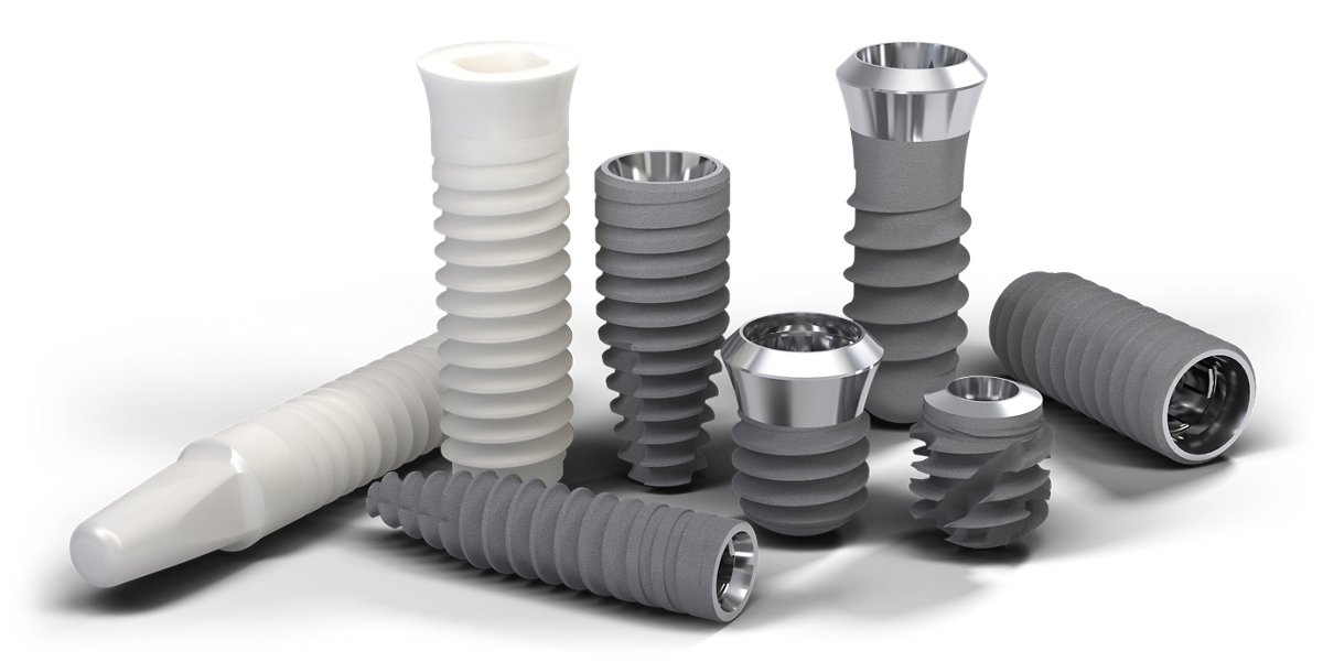 Dental implant materials and surfaces